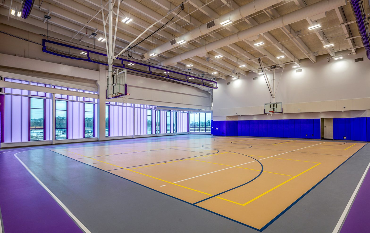 A community center that glows purple - Construction Specifier